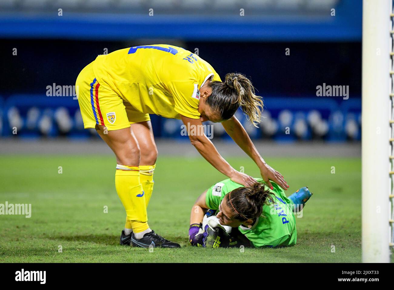 Romania's Florentina Olar with Romania's Andrea Paraluta during the ...