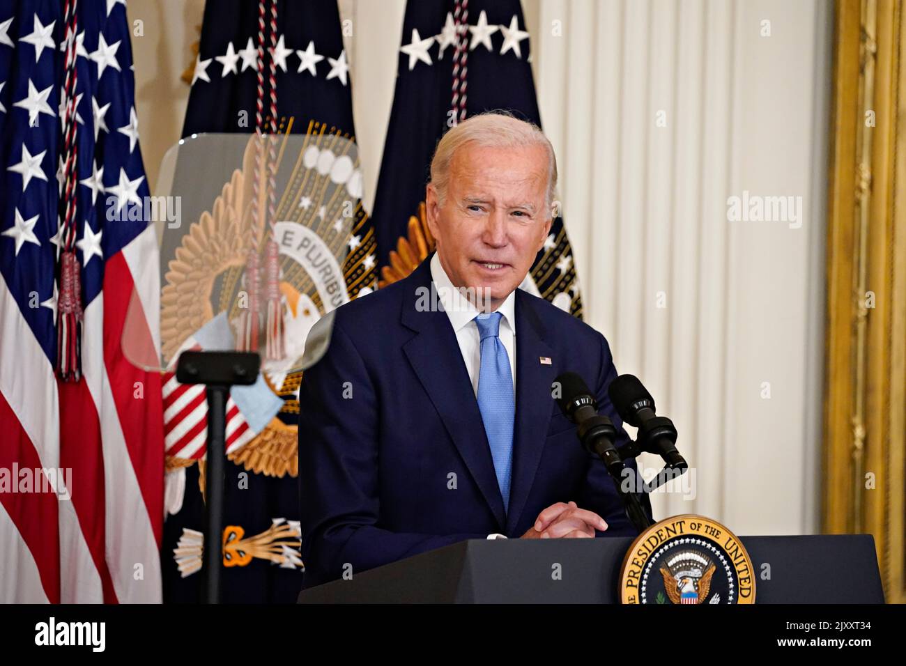 United States President Joe Biden speaks during a ceremony with former ...