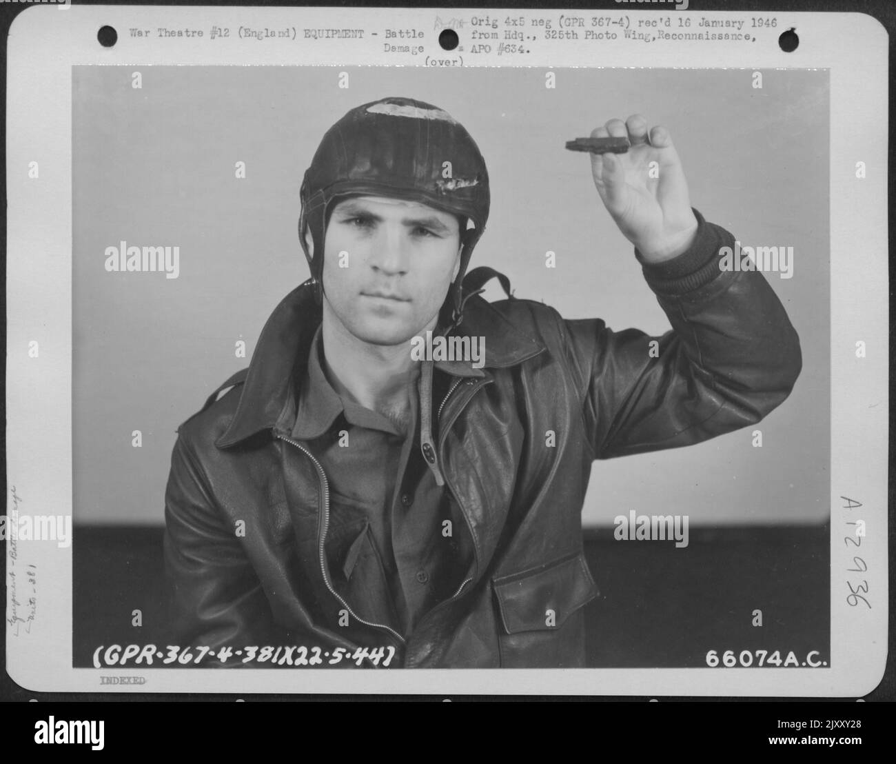 Gunner Of The 381St Bomb Group, Wearing Helmet Which Was Pierced By The ...