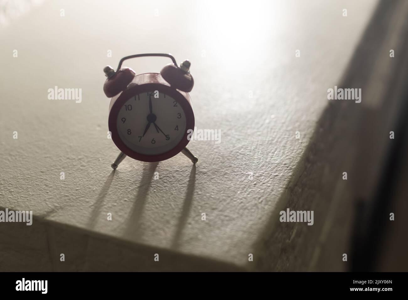 Retro alarm clock with seven o'clock. Old style filtered photo Stock ...