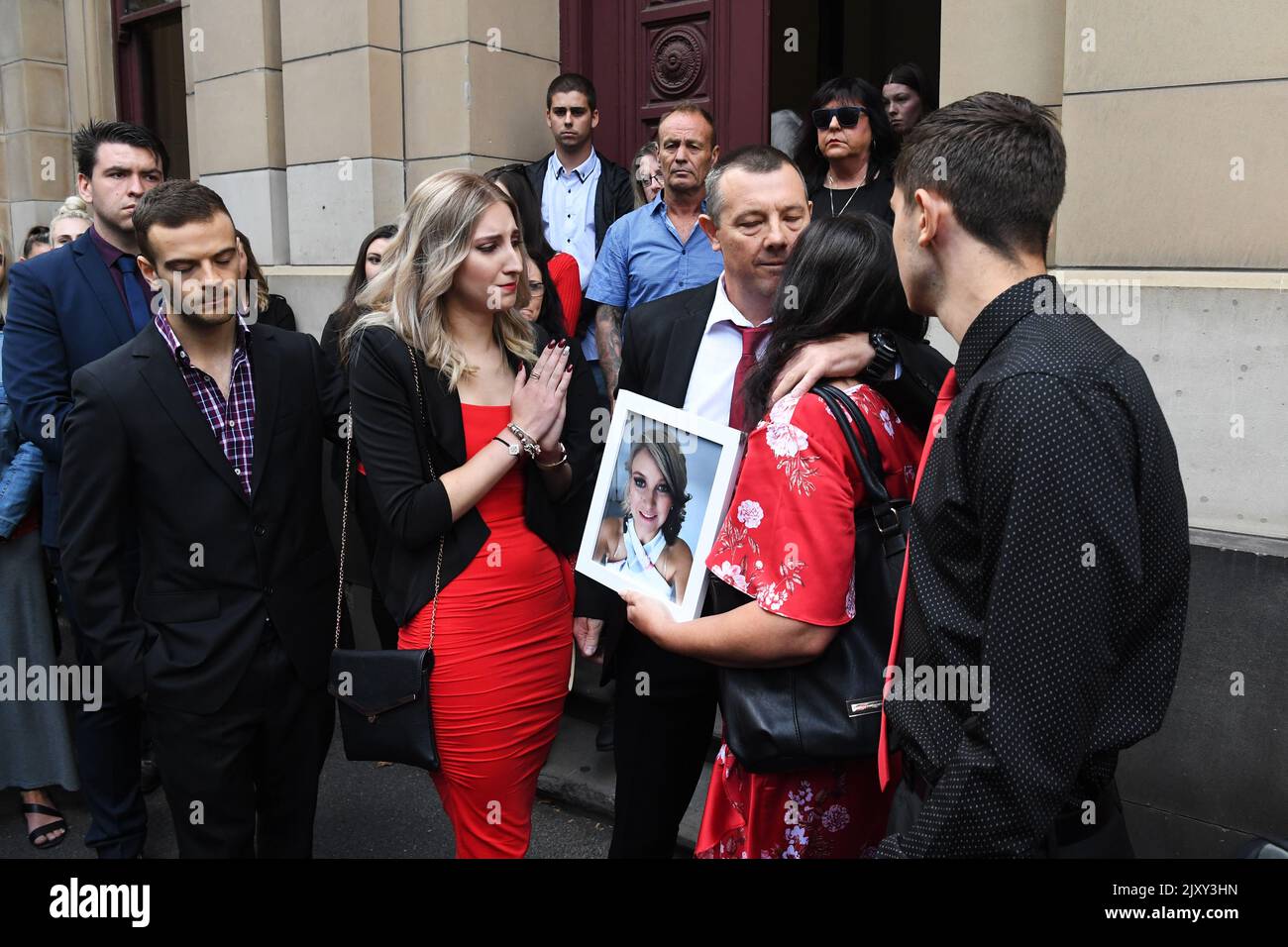 Bianca Unwin (centre left), the sister of victim Katie Haley, and Boyd ...