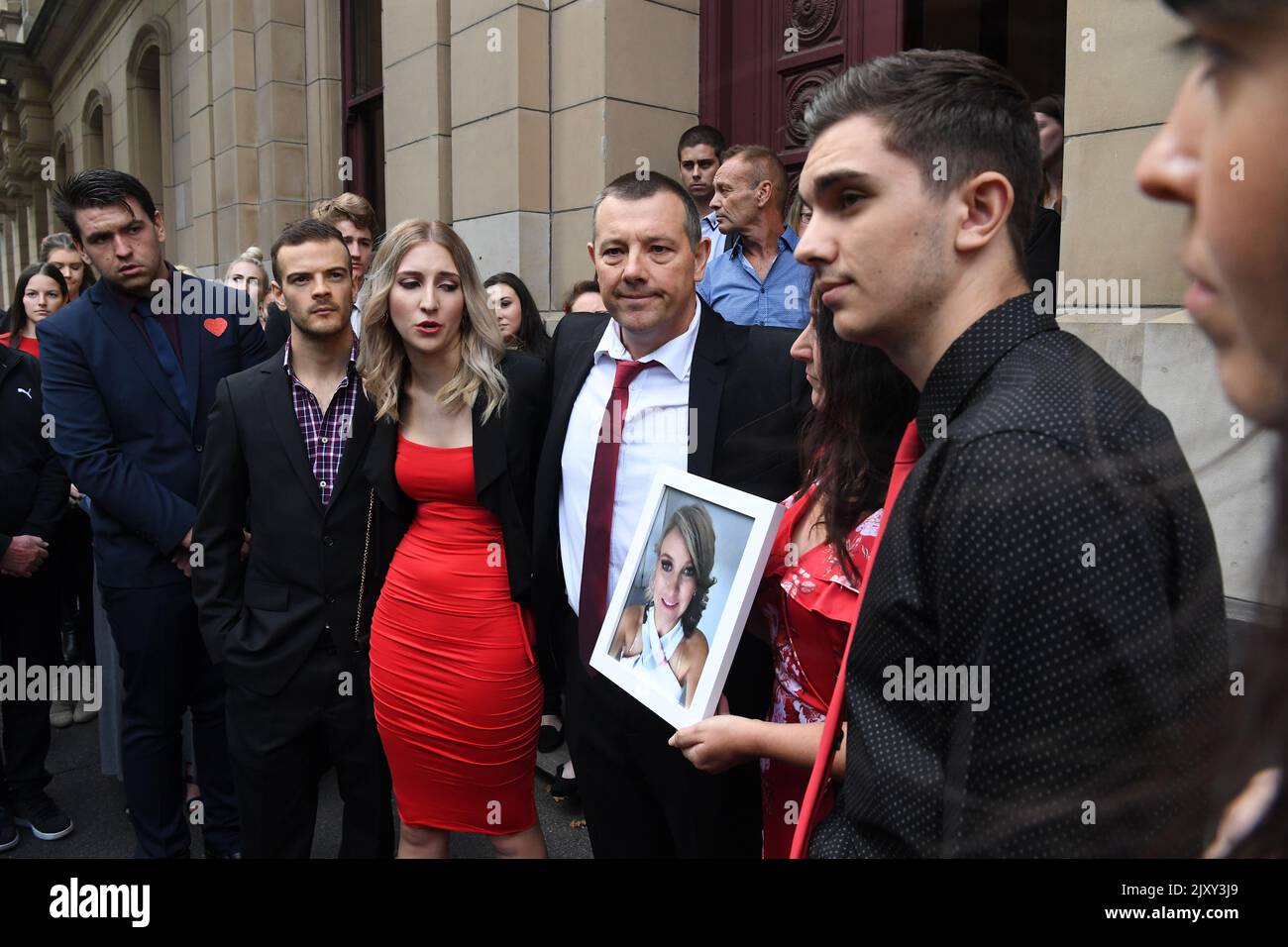 Family members of victim Katie Hayley; Bianca Unwin (centre left), Boyd ...
