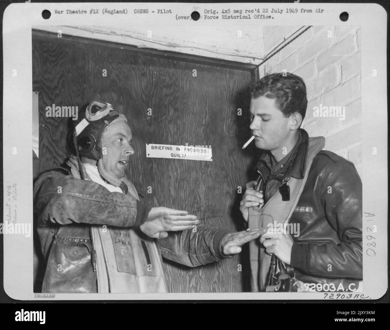 Two Pilots Of The 410Th Bomb Group Discuss A Mission. 9Th Air Force ...