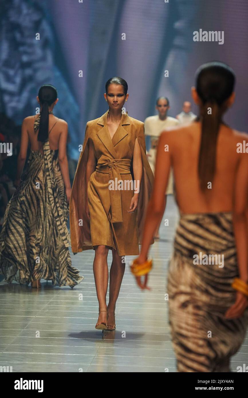 A model wearing Carla Zampatti walks the runway during the Virgin ...