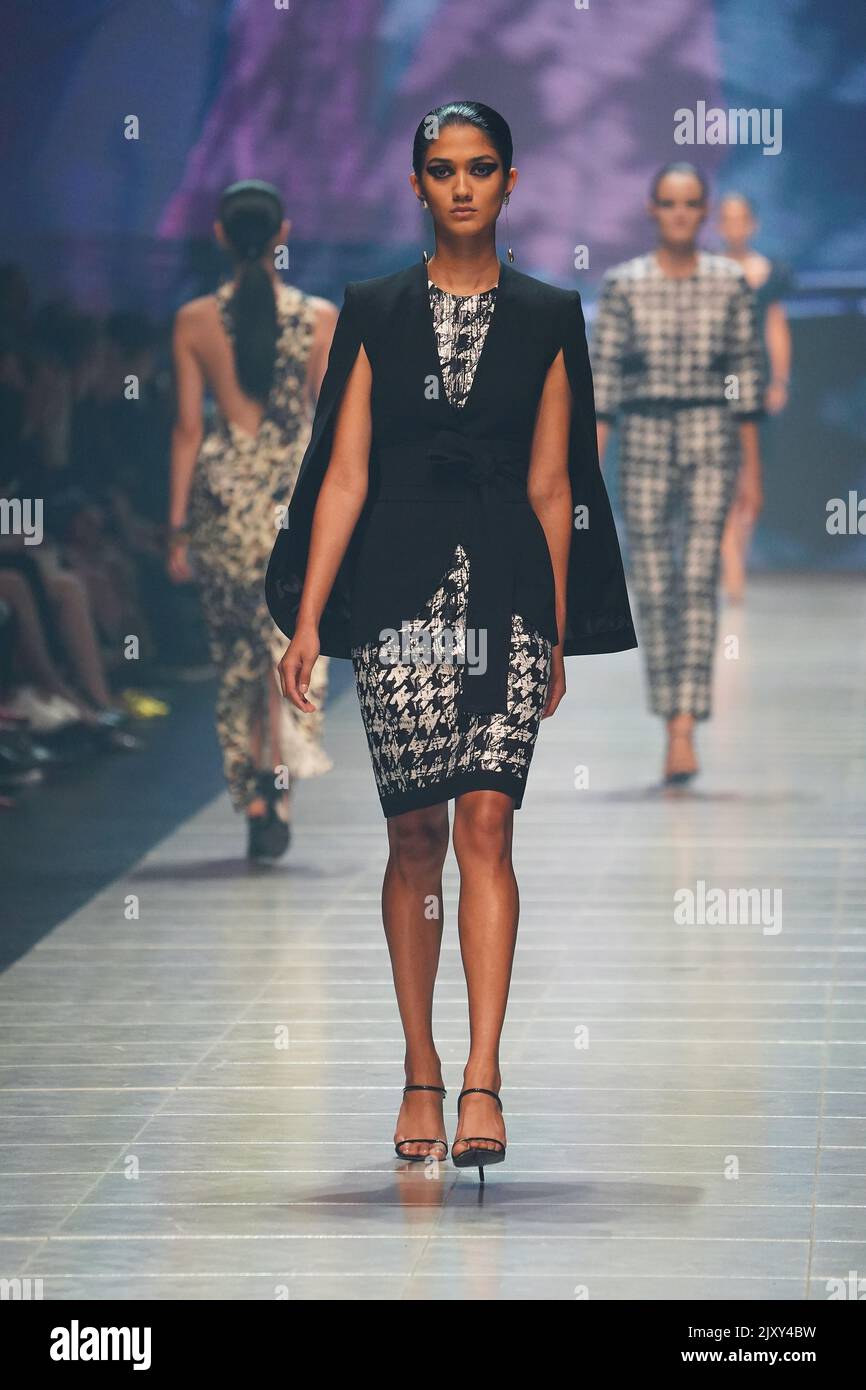 A model wearing Carla Zampatti walks the runway during the Virgin ...