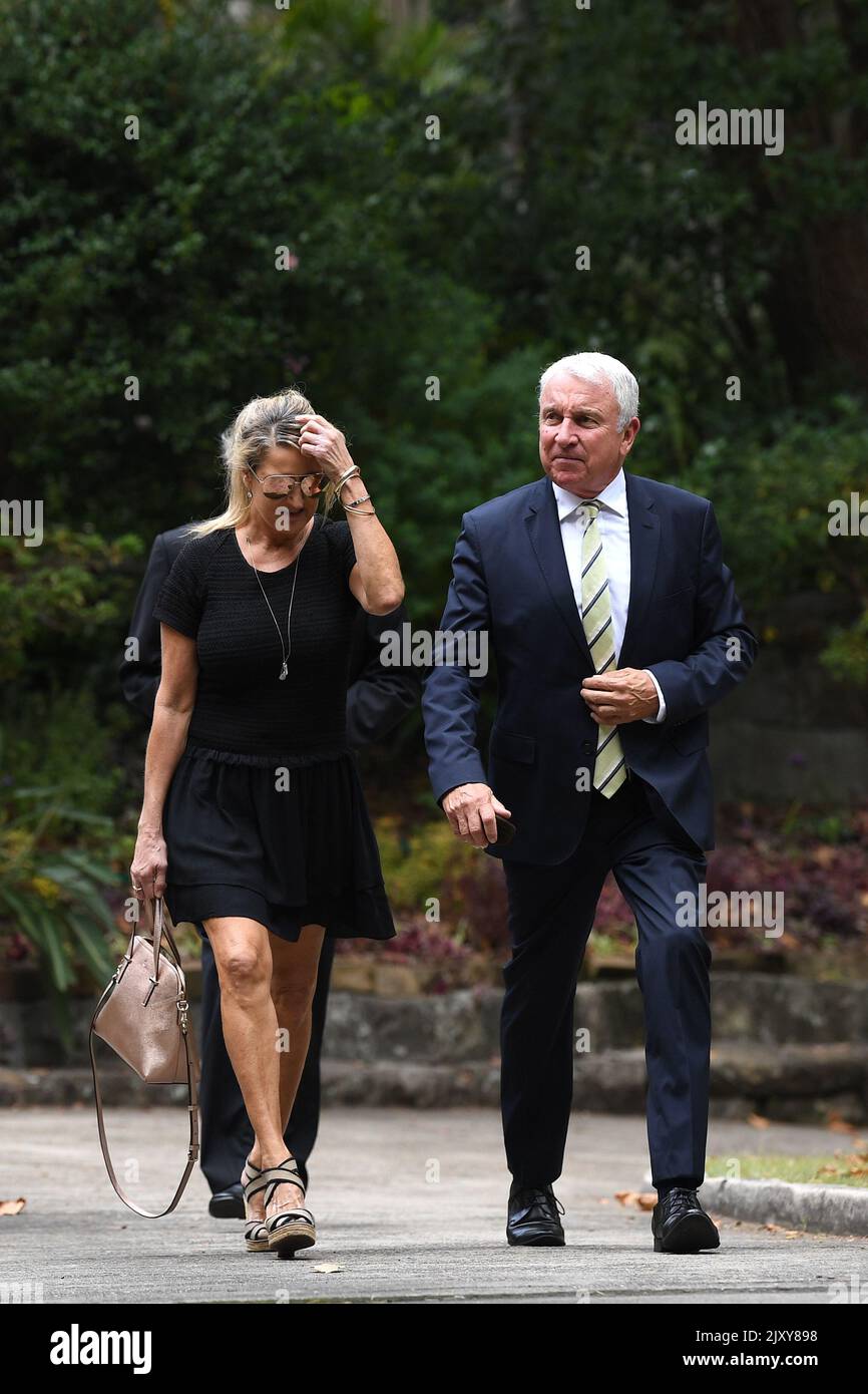 John Hartigan (right) arrives at the funeral of John Kennerley, husband ...