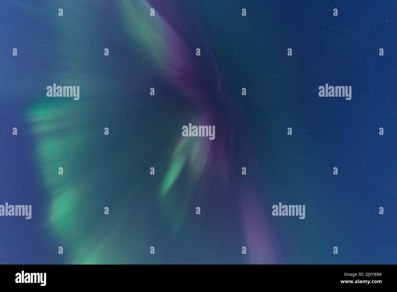 Aurora borealis light rays, Northern green violet red lights in night ...