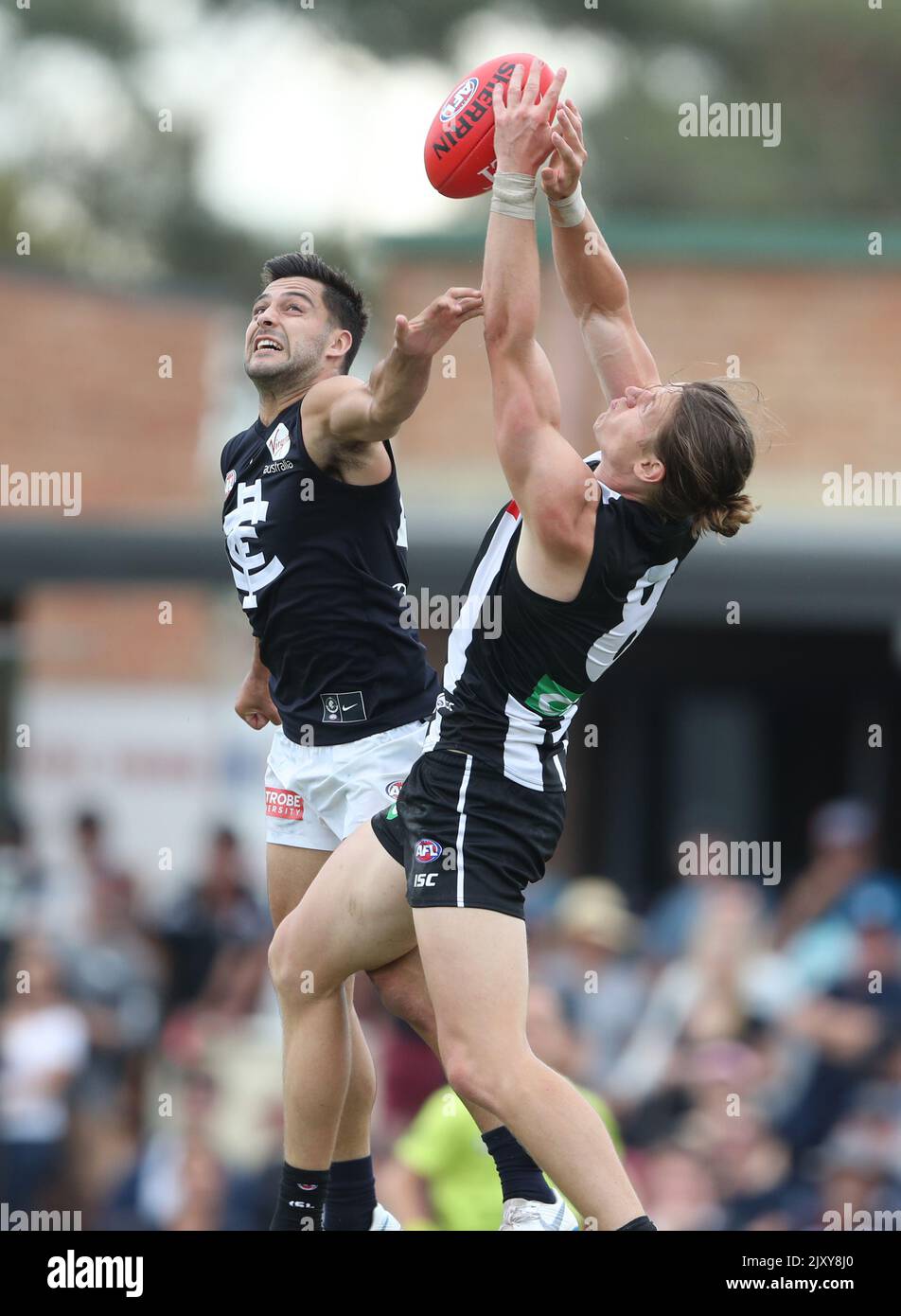 Tom Langdon takes a mark for Collingwood during the AFL JLT Community ...