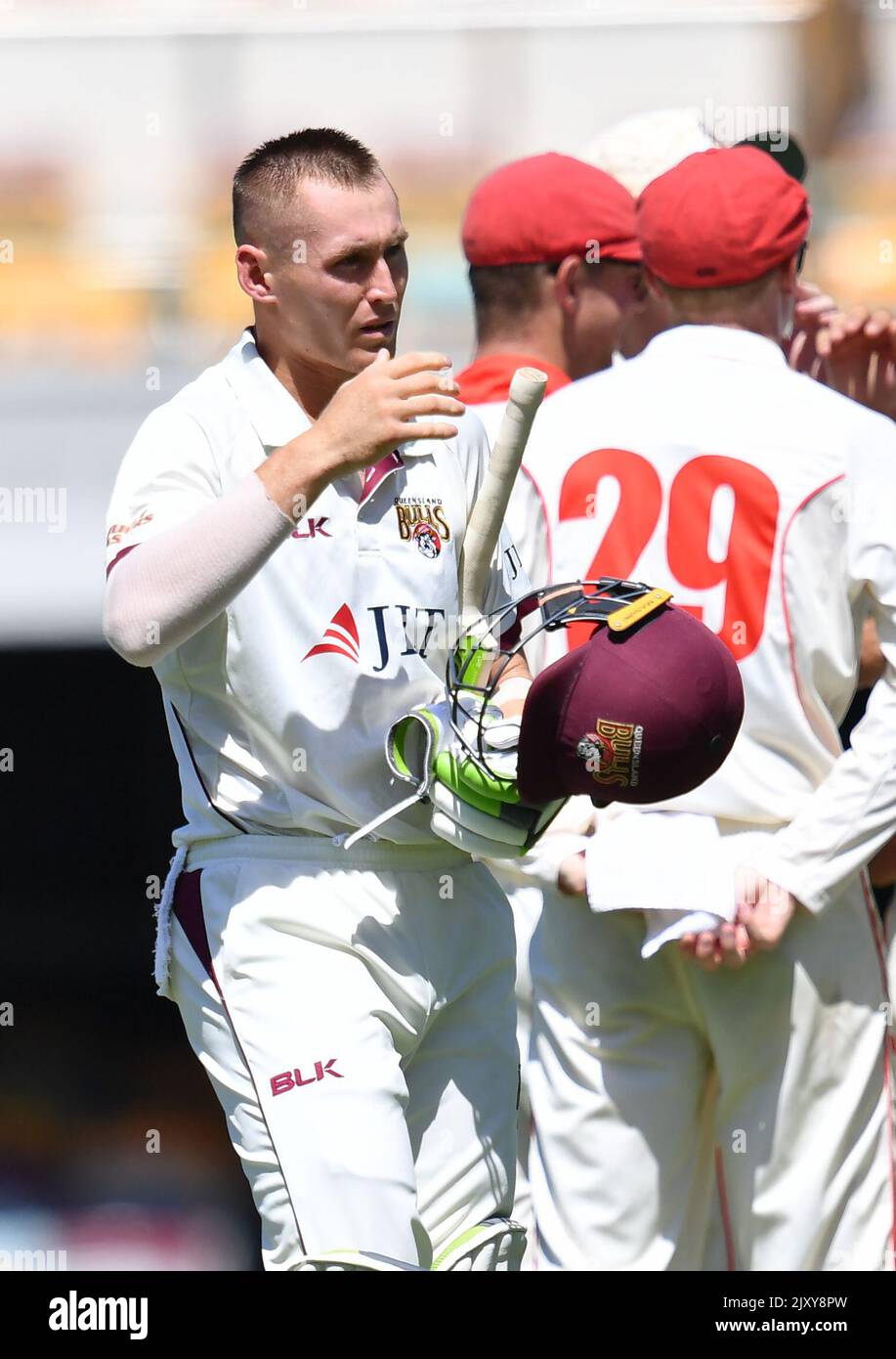 Marnus Labuschagne (right) of Queensland is seen reacting after losing ...