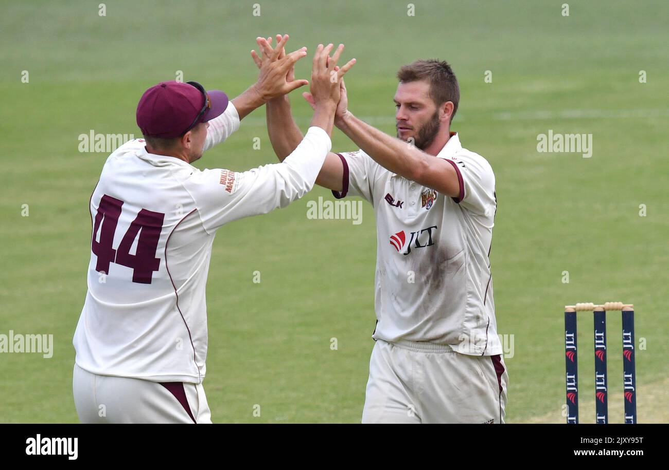 Mark Steketee (right) of Queensland celebrates with team mates after ...