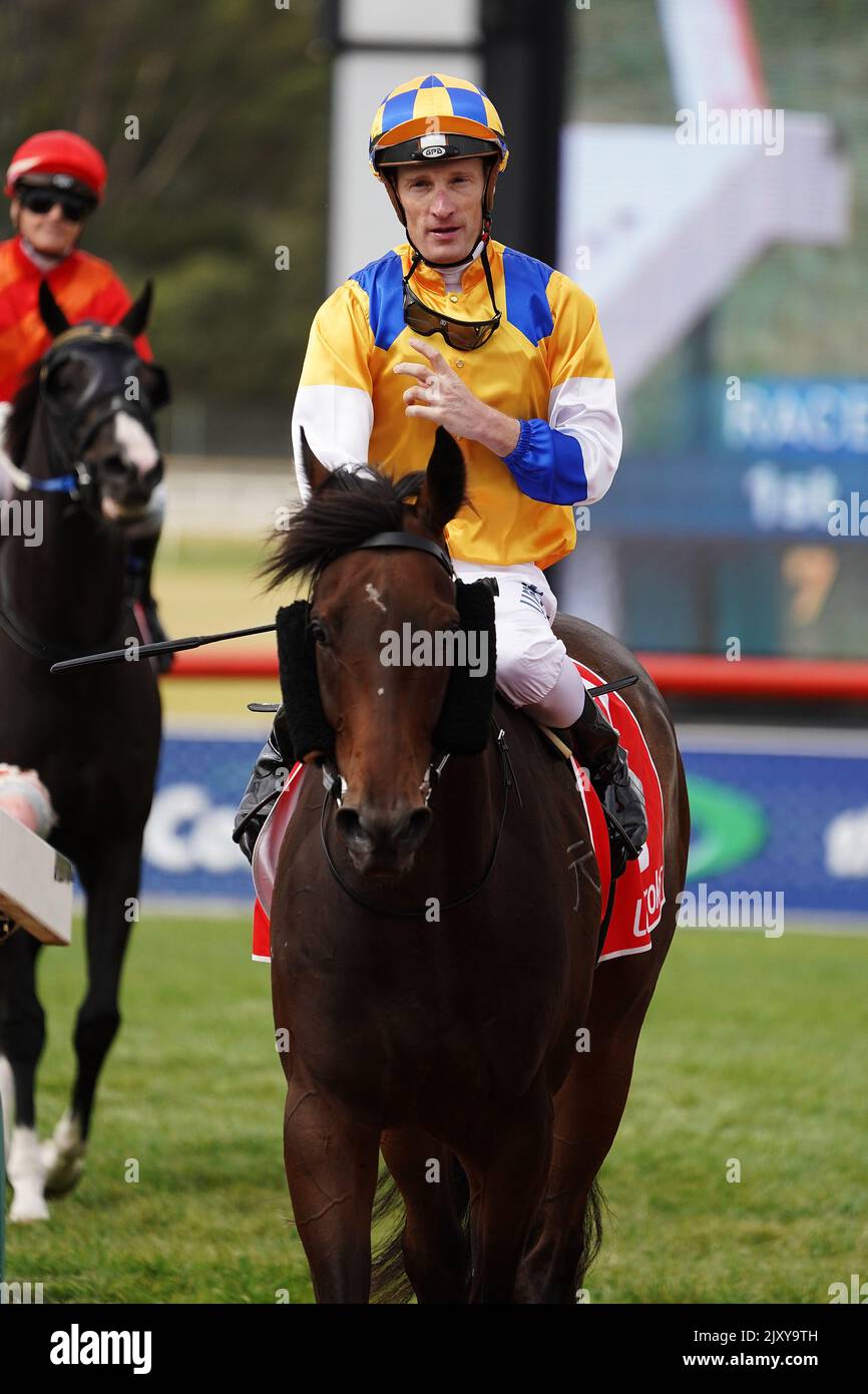 Jockey Mark Zahra returns to the scale after riding Smiling City to ...