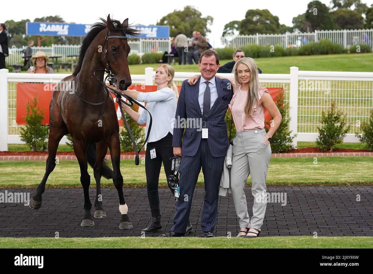 Trainer Gemma Rielly and an owner pose with La Belle Jude after their ...