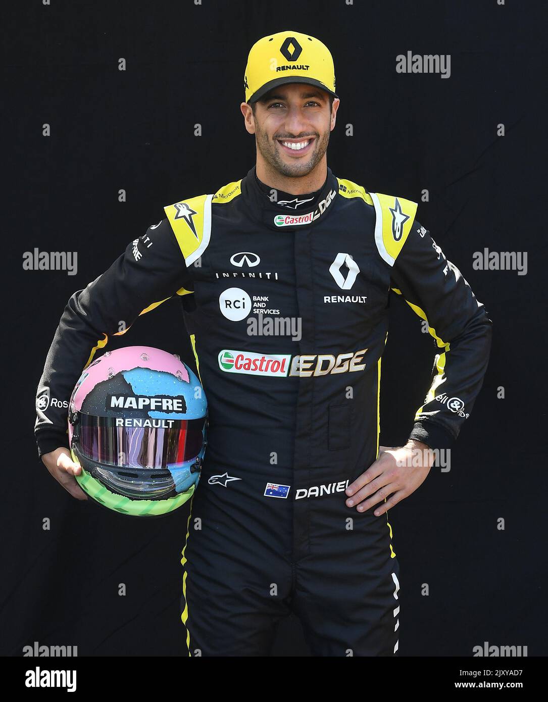 Daniel Ricciardo of Australia poses for a photograph in his new team ...