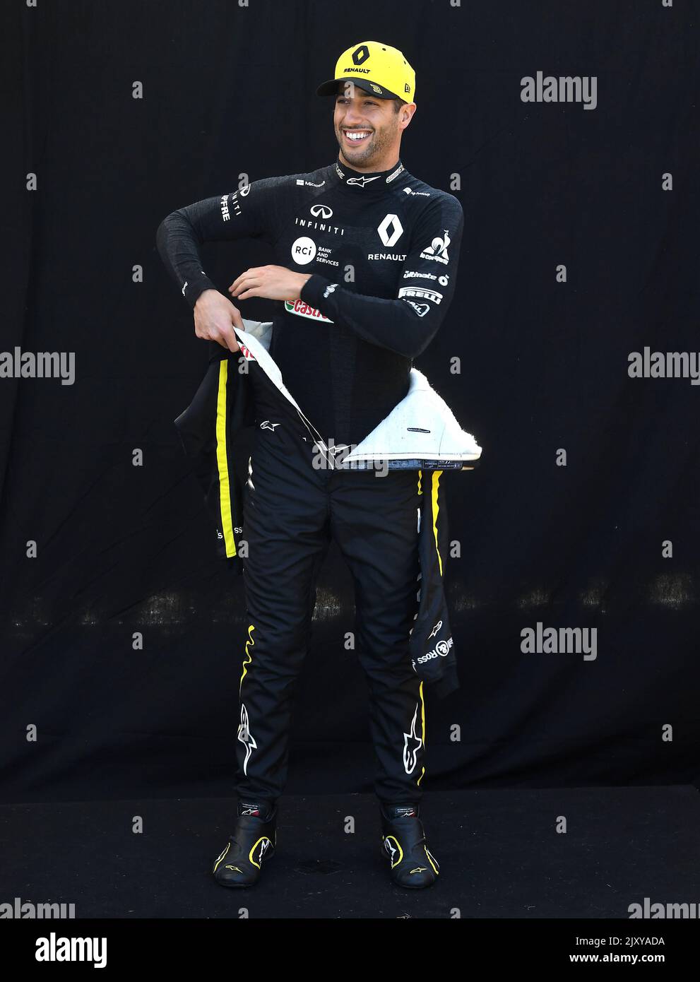 Daniel Ricciardo of Australia poses for a photograph in his new team ...