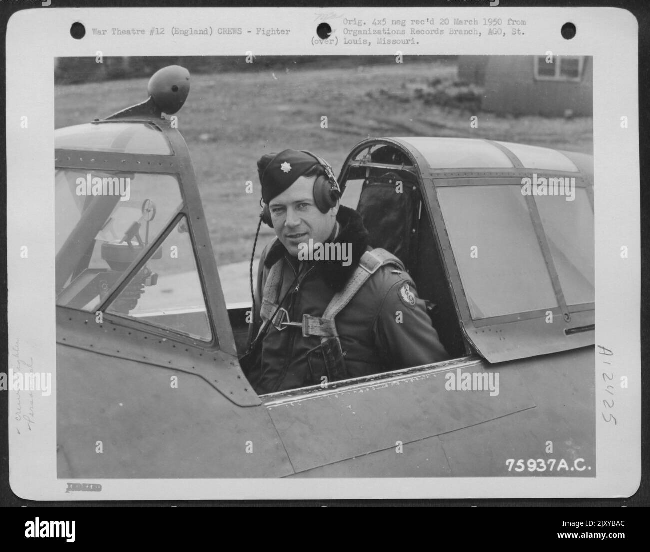 Lt. Colonel Young Seated In The Cockpit Of A Republic P-47 At An Air ...