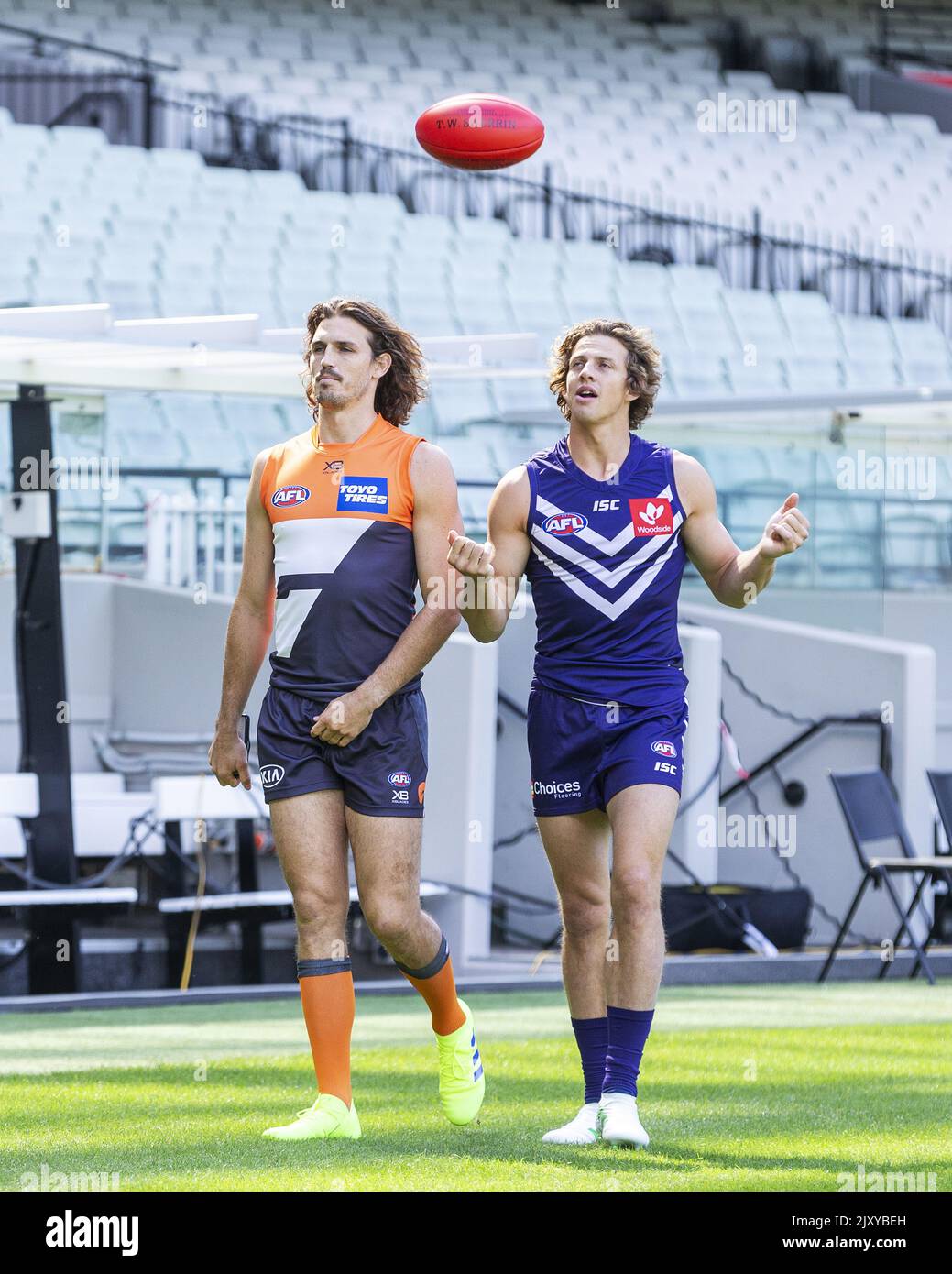 Phil Davis of the Giants (left) and Nat Fyfe of the Dockers are seen as ...