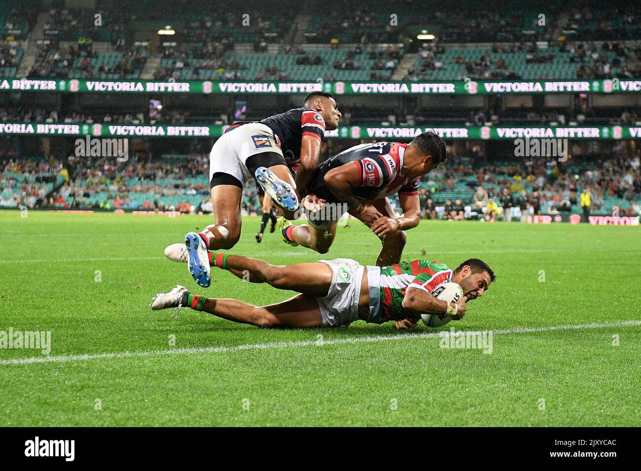 Alex Johnston of the Rabbitohs scores a try during the Round 1 NRL ...