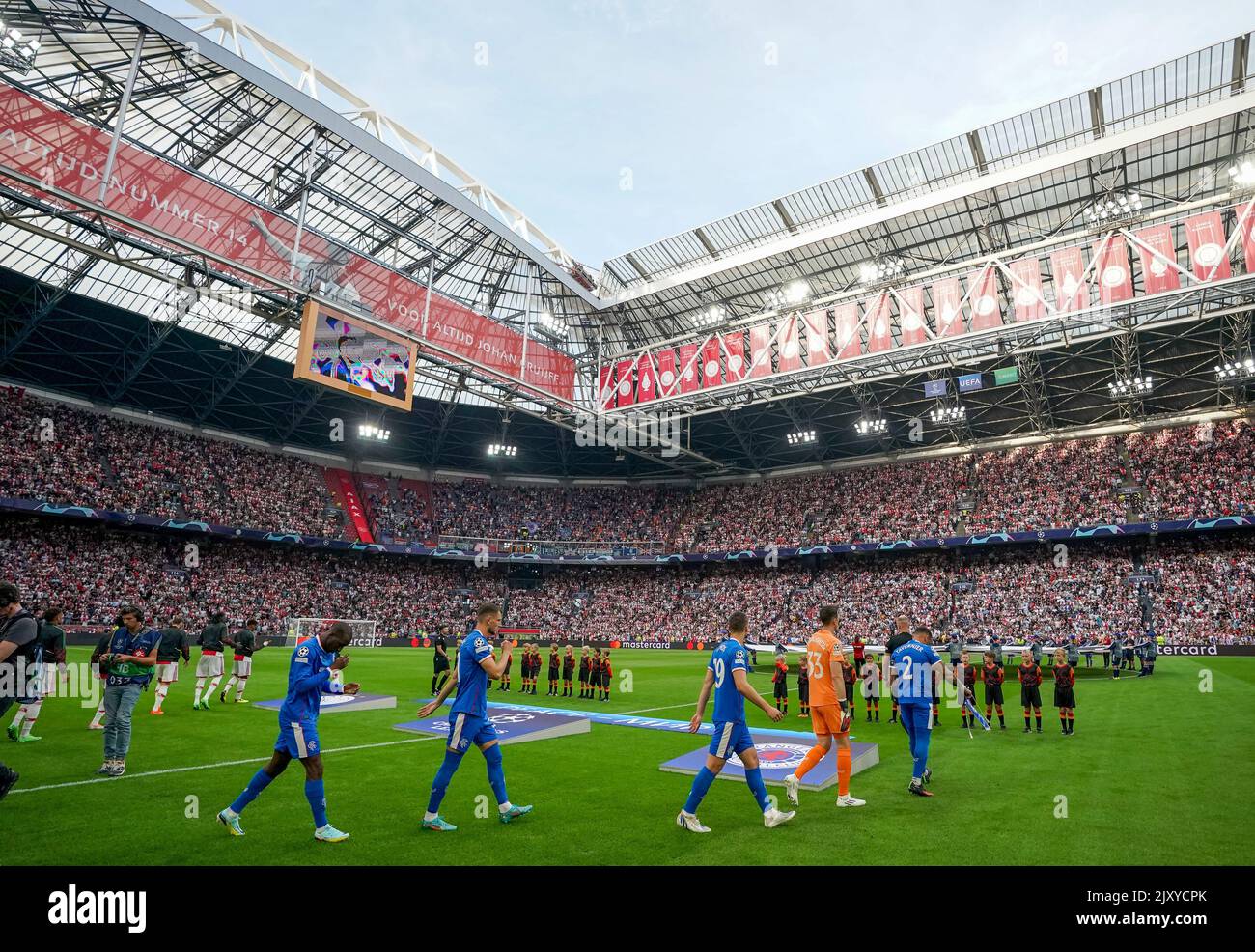 The players walk out ahead of the UEFA Champions League Group F match ...