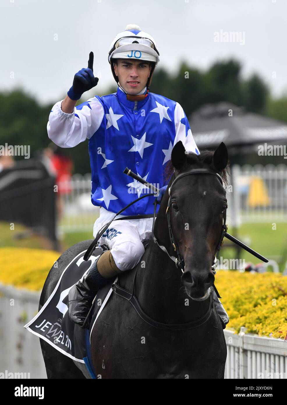 Jockey James Orman celebrates riding The Odyssey to victory in race 7 ...