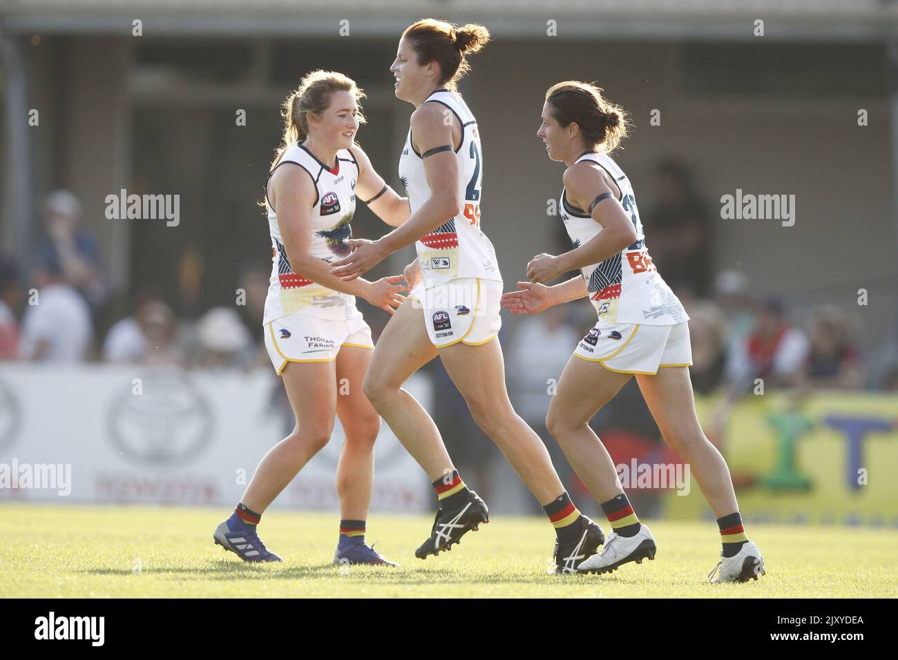 Jessica Foley of the Crows (centre) celebrates a goal during the Round ...