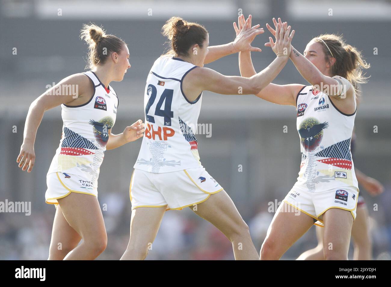 Jessica Foley of the Crows (centre) celebrates a goal during the Round ...