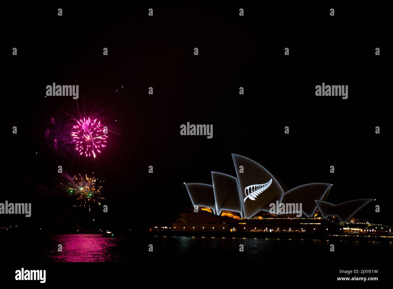 The Silver Fern of New Zealand is seen projected onto the sails of the ...
