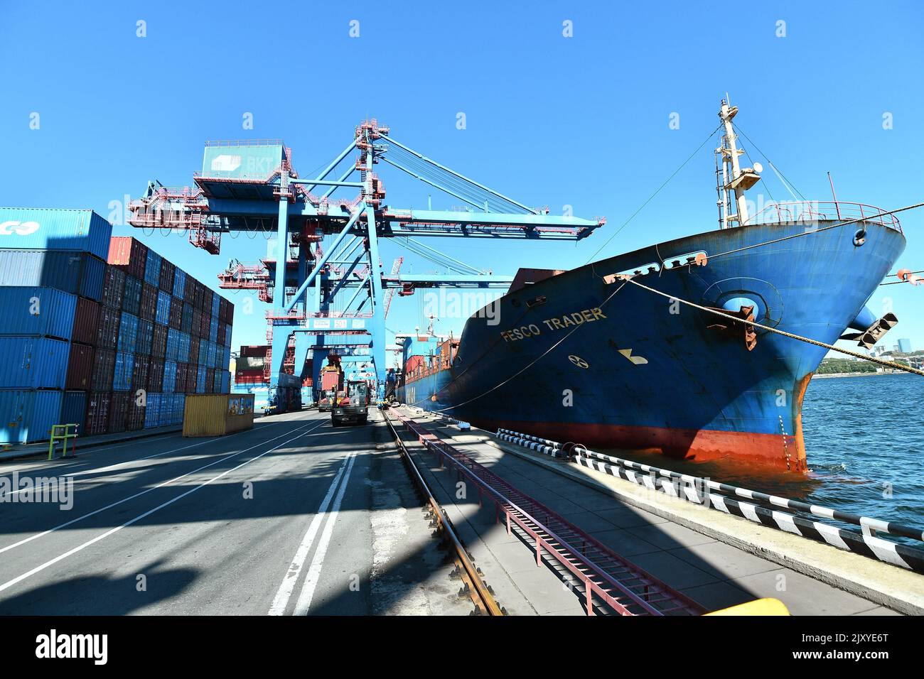 Sea port of Vladivostok. Unloading a ship from Cyprus at the port's ...