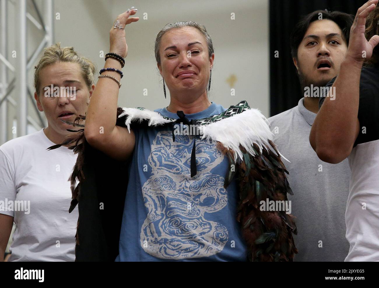 Helena Maxwell (centre) reacts while performing a traditional Maori ...