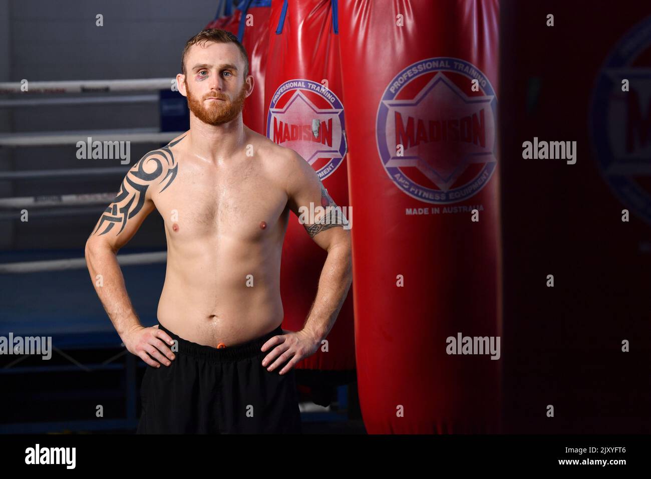 Boxer Dennis Hogan is seen posing for a photograph after a training ...