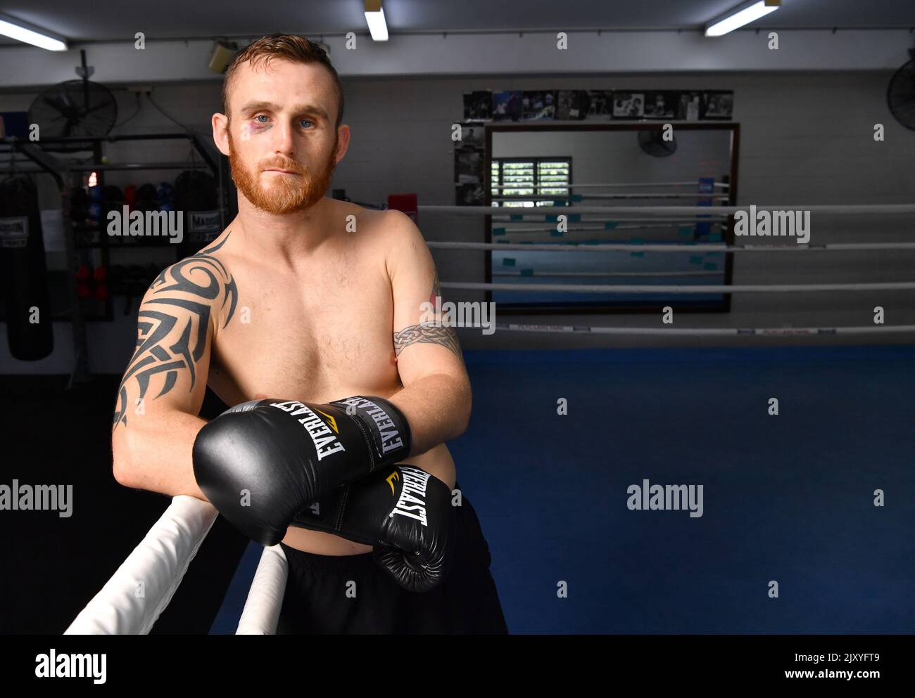 Boxer Dennis Hogan is seen posing for a photograph after a training ...