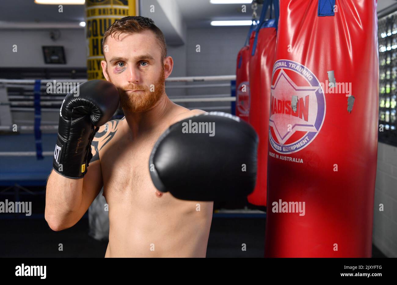 Boxer Dennis Hogan is seen posing for a photograph after a training ...
