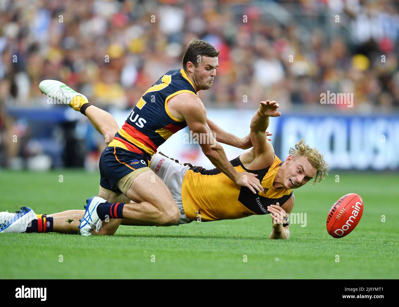 Brad Crouch of the Crows and James Worpel of the Hawks during the Round ...
