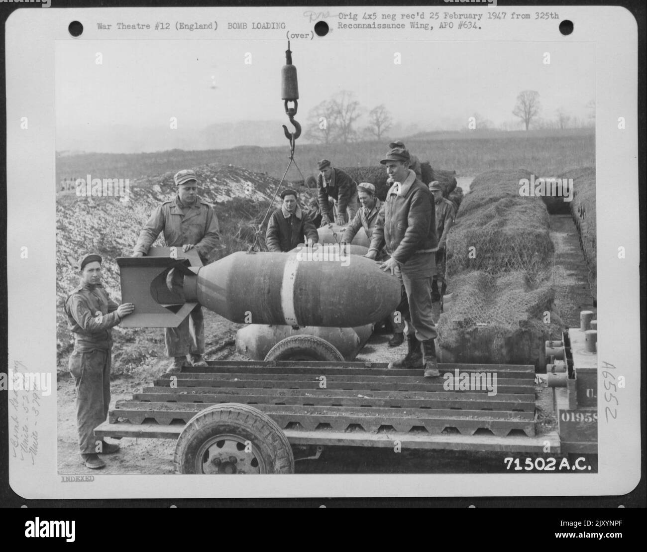Men Loading Bomb On Bomb Dolly At A Dump Of The 525Th Bomb Squadron ...