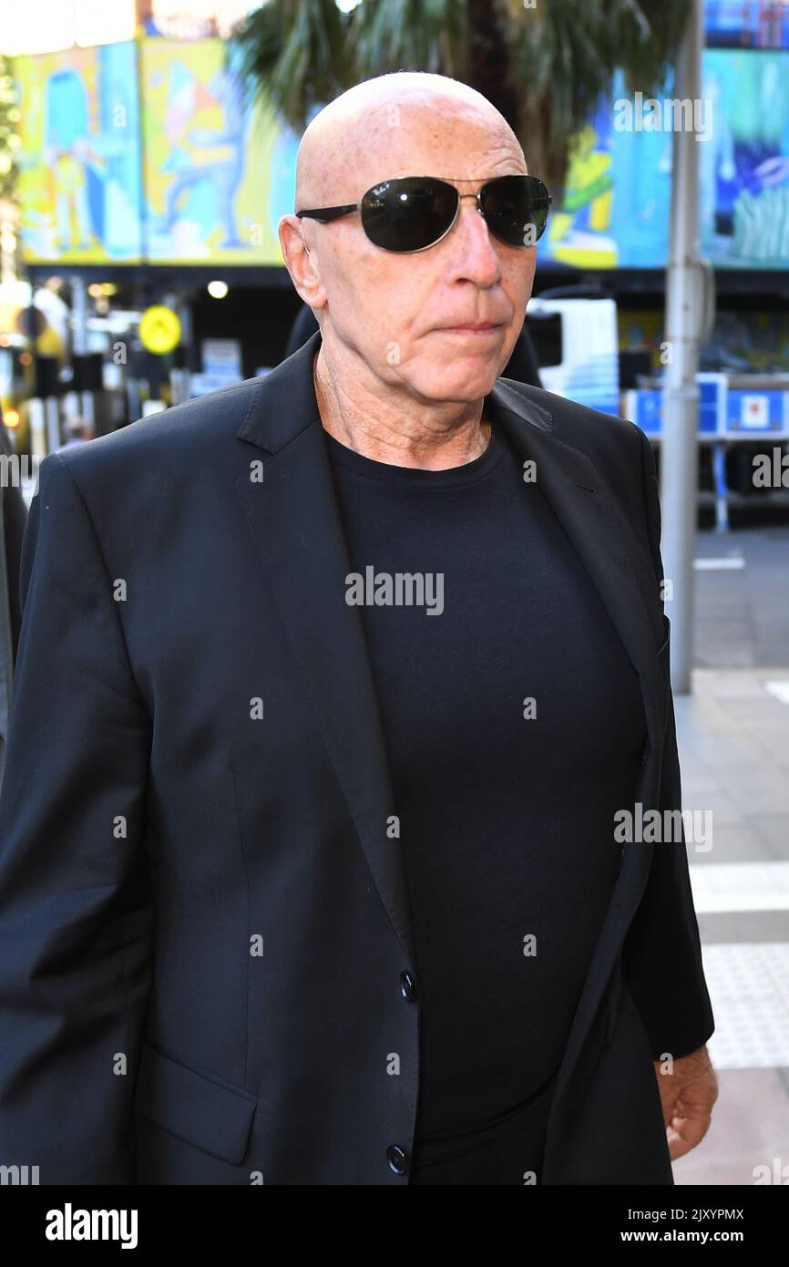Tom Domican (right) arrives at the Federal Court in Sydney, Tuesday ...