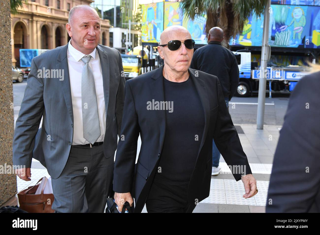 Tom Domican (right) arrives at the Federal Court in Sydney, Tuesday ...