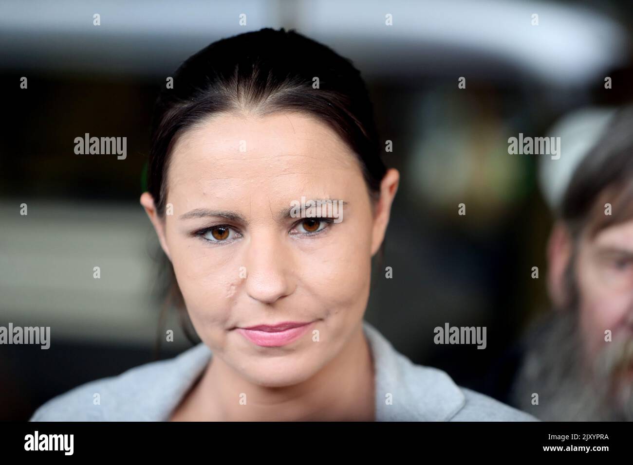 Victim Rex Courts' sister Sarah Danielson reads a statement outside the ...