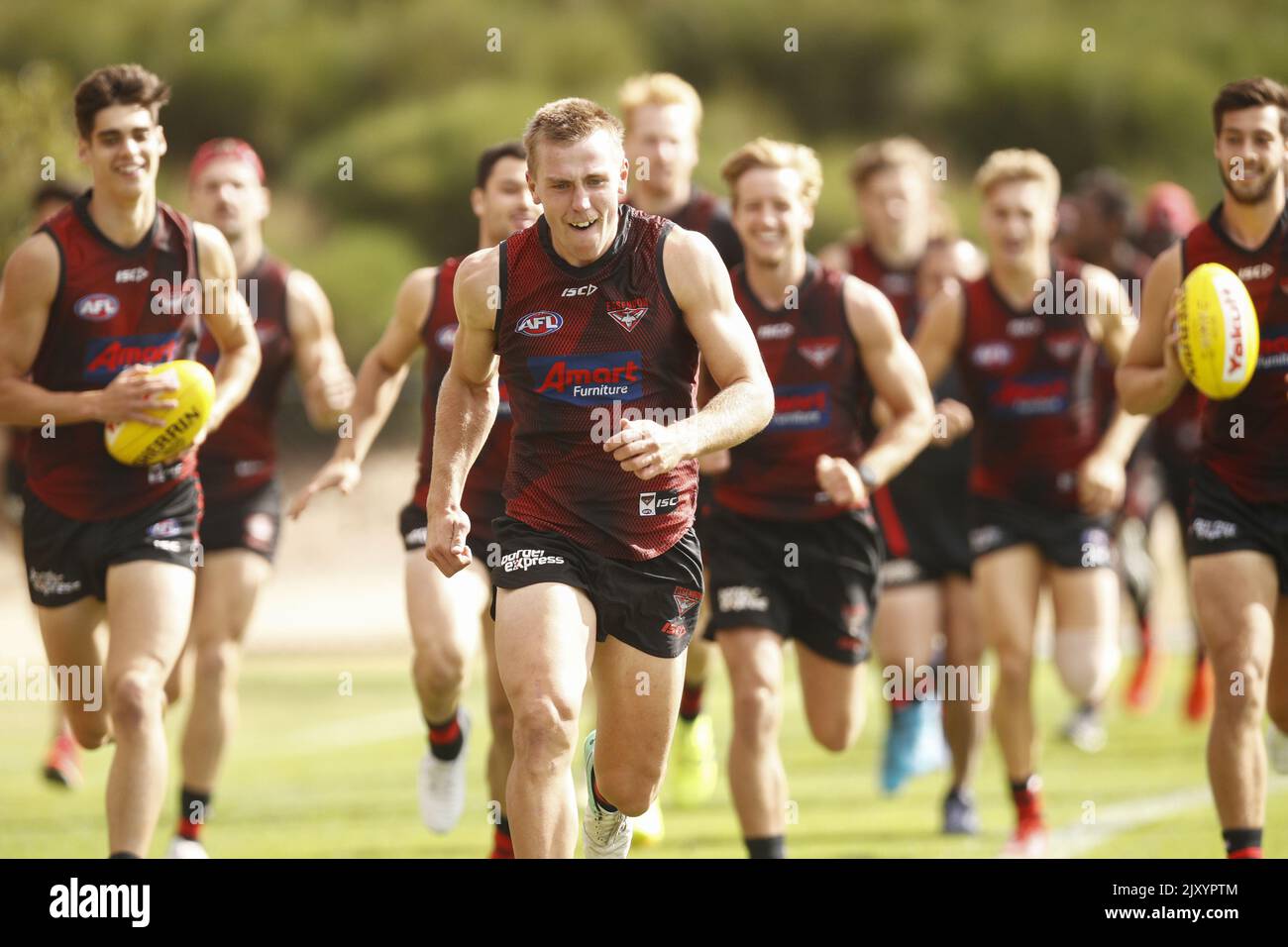 Josh Begley (centre) is seen during an Essendon Bombers training ...