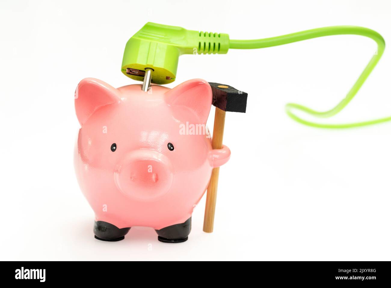 Green electric cable and piggy bank, Saving concept by using ...