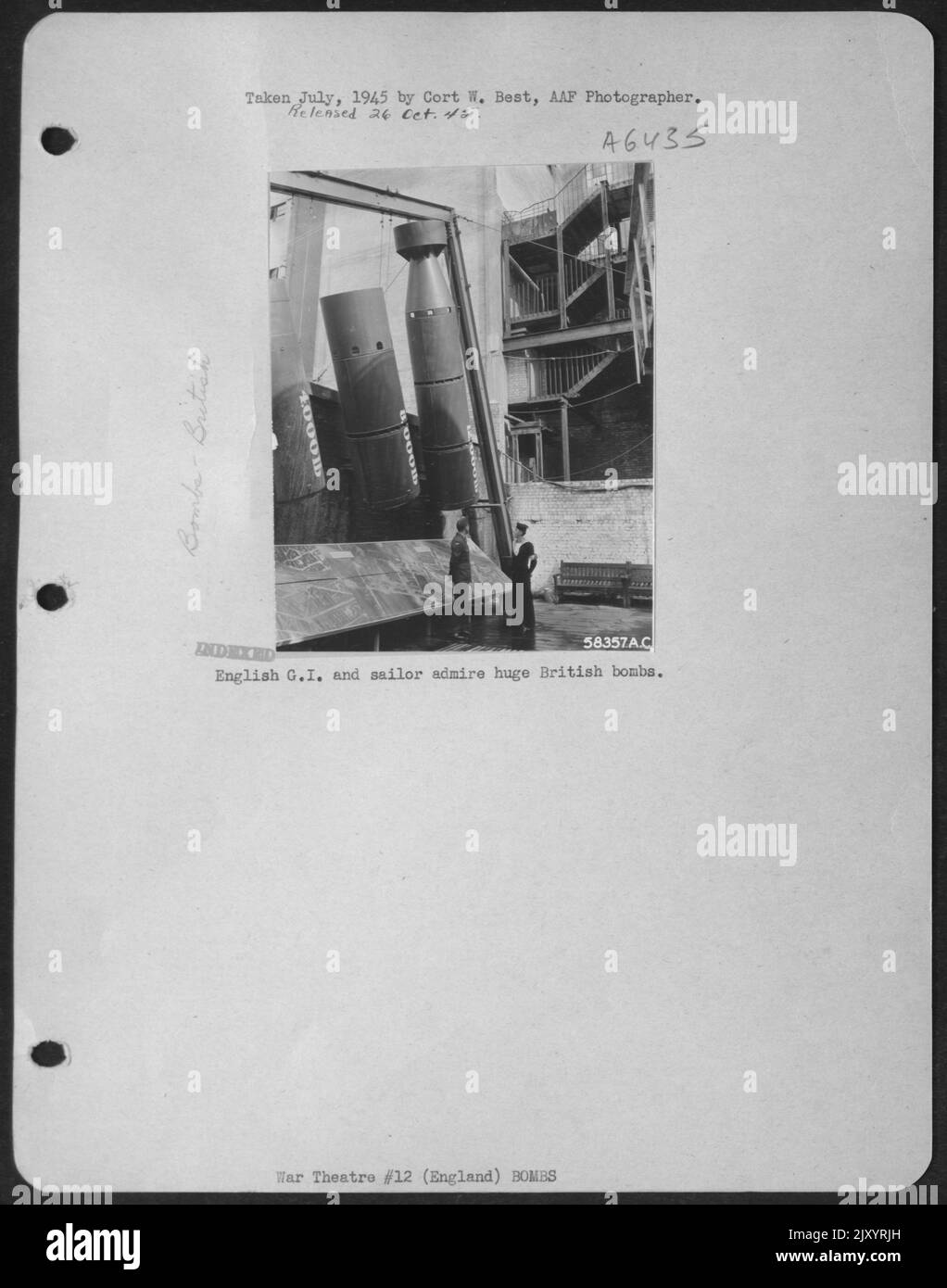 English G.I. And Sailor Admire Huge British Bombs Stock Photo - Alamy