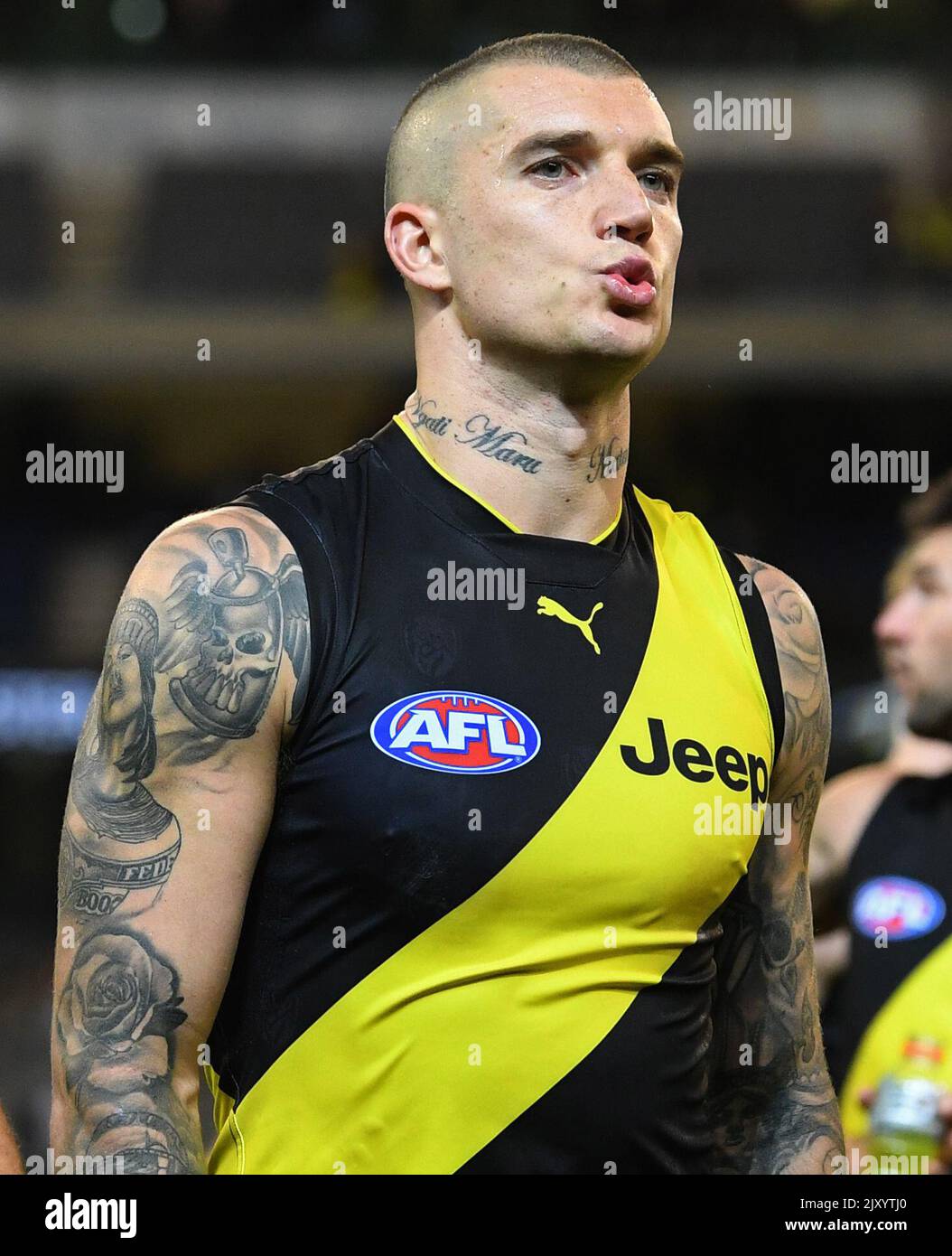 Dustin Martin of the Tigers reacts after kicking the Round 2 AFL match ...