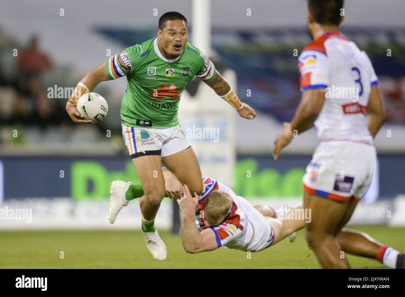 Joseph Leilua of the Raiders is tackled by Mitchell Barnett of the ...