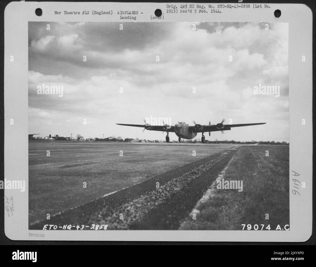 A Consolidated B-24 "Liberator" Comes In For A Landing At An 8Th Air ...