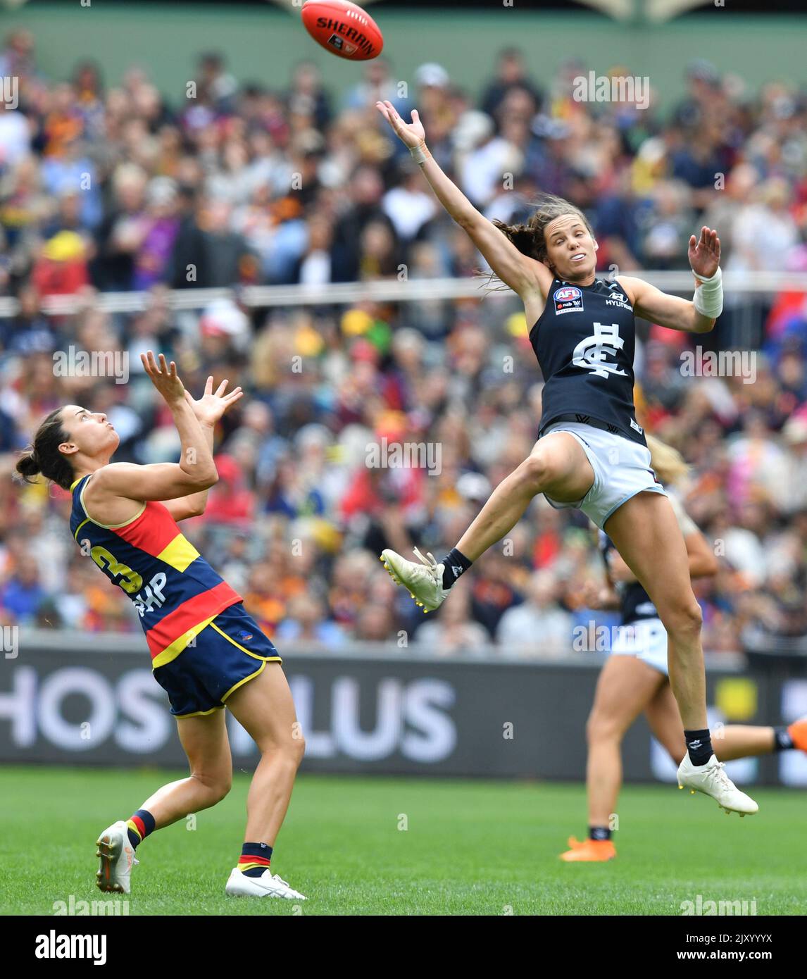 Angela Foley of the Adelaide Crows and Chloe Dalton of the Blues during ...