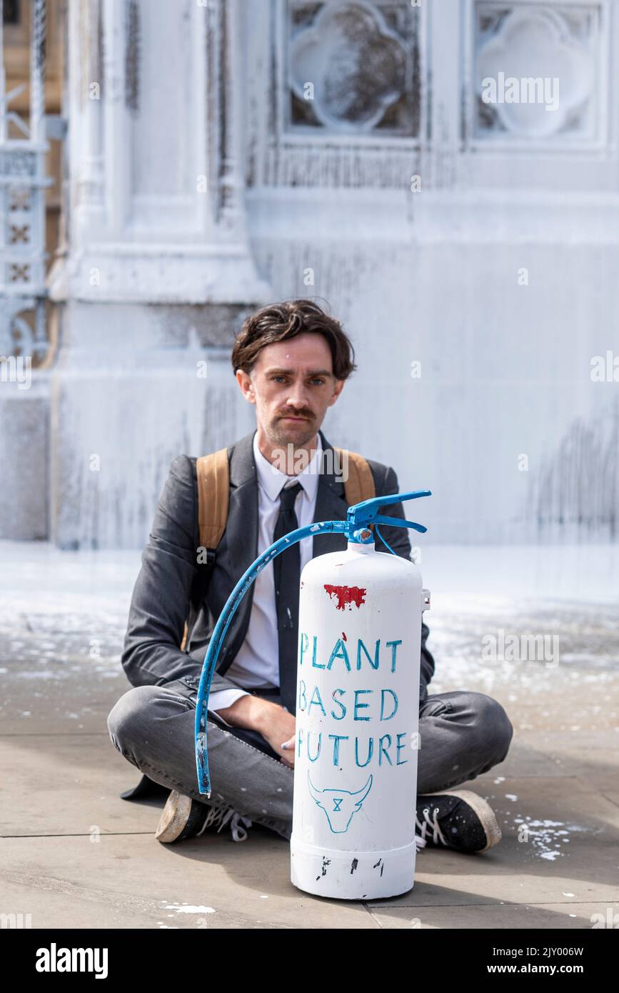 Animal Rebellion protesters sprayed a wall of the Palace of Westminster ...