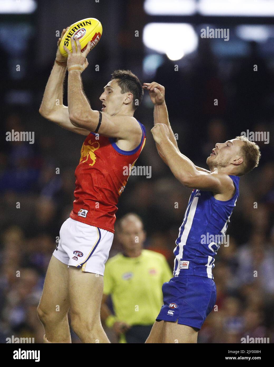 Oscar McInerney of the Lions marks the ball during the Round 2 AFL ...