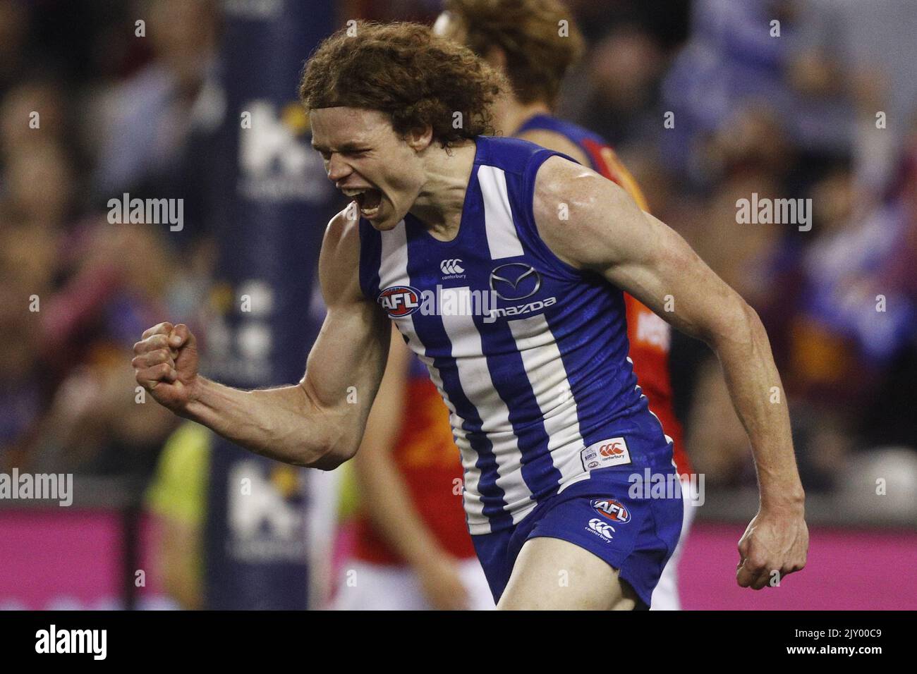 Ben Brown of the Kangaroos celebrates a goal during the Round 2 AFL ...