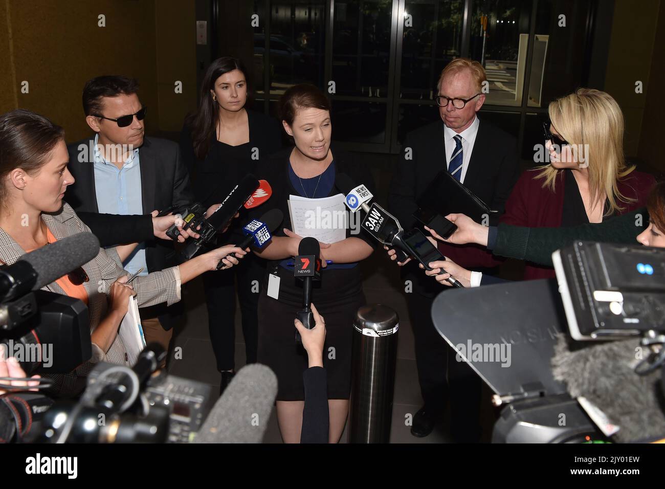 Lawyer of the victims family's Genna Angelowitsch (centre) addresses ...