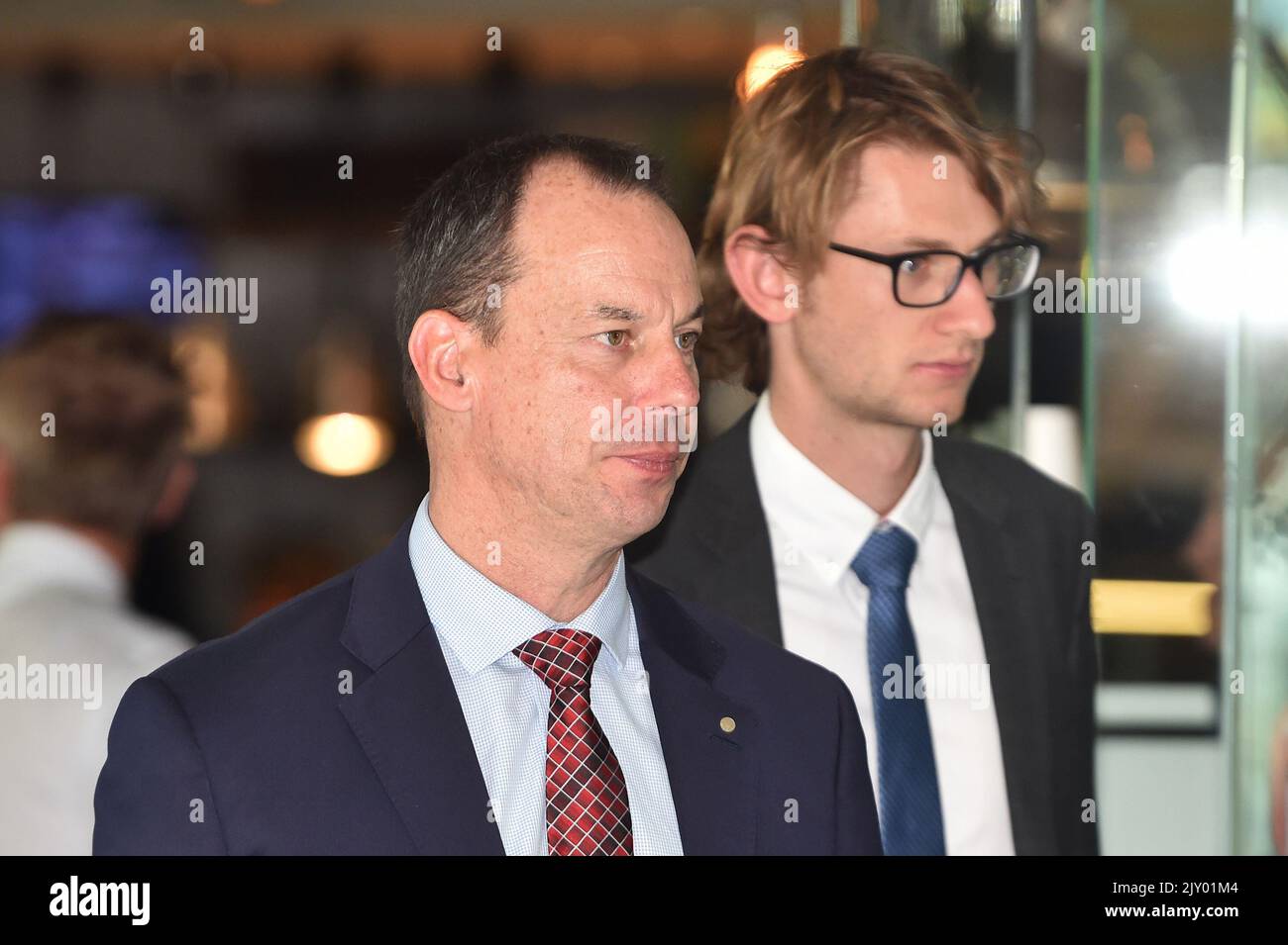 Witness Jeff Pope (left) arrives at the Victorian Royal Commission into ...
