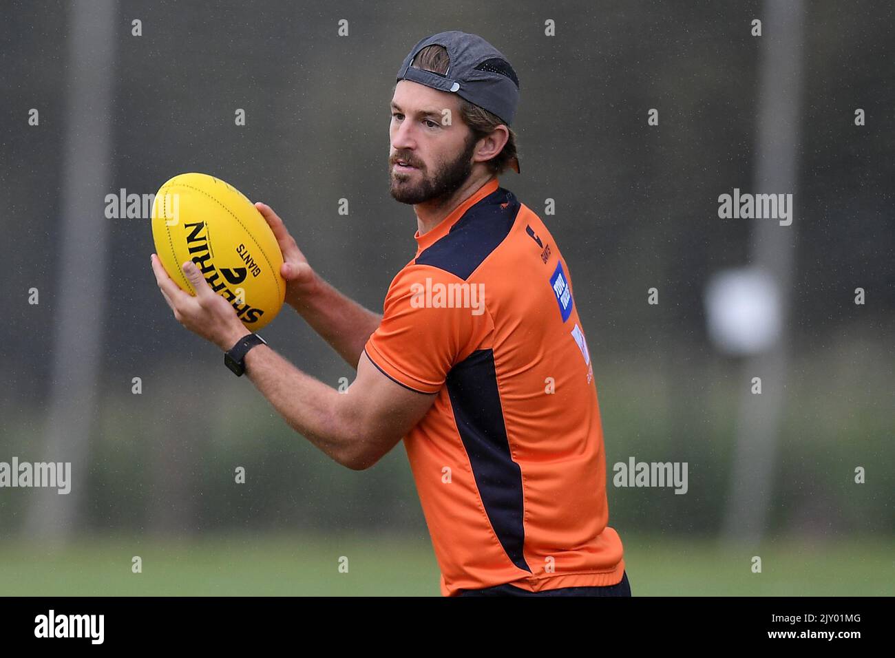 GWS Giants player Callan Ward takes part in a training session at ...