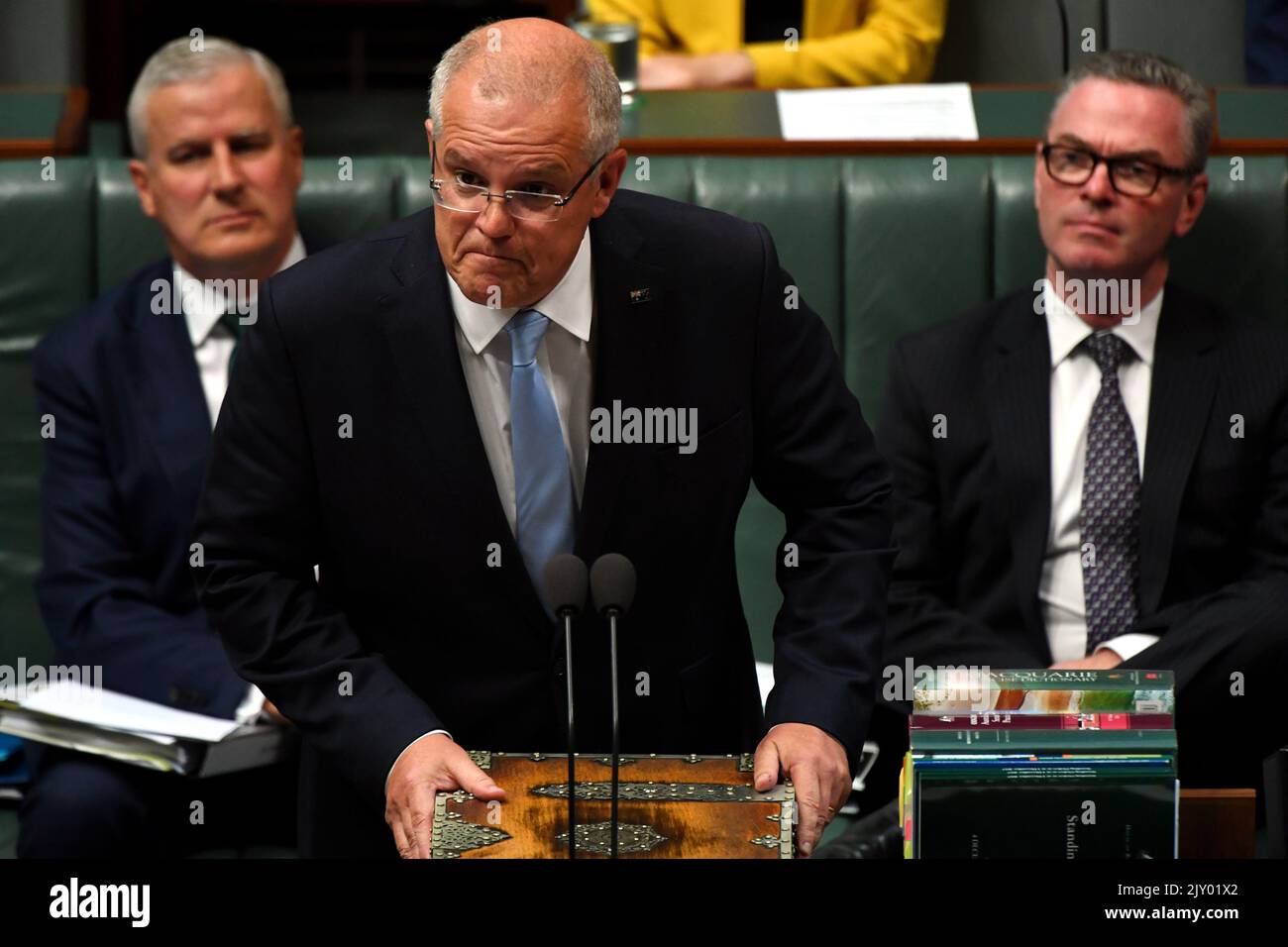 Prime Minister Scott Morrison (centre) speaks at the despatch box ...